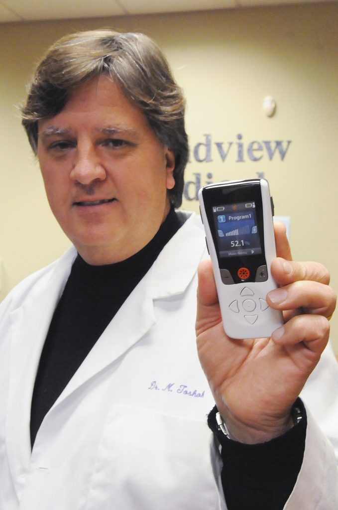 Masking the Pain - Herald-Standard